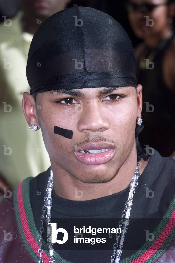 Image of Nelly goes though an arrival line during the first annual