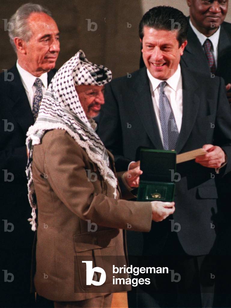 Image of PLO Chairman Yasser Arafat shows the Houphet-Boigny peace ...