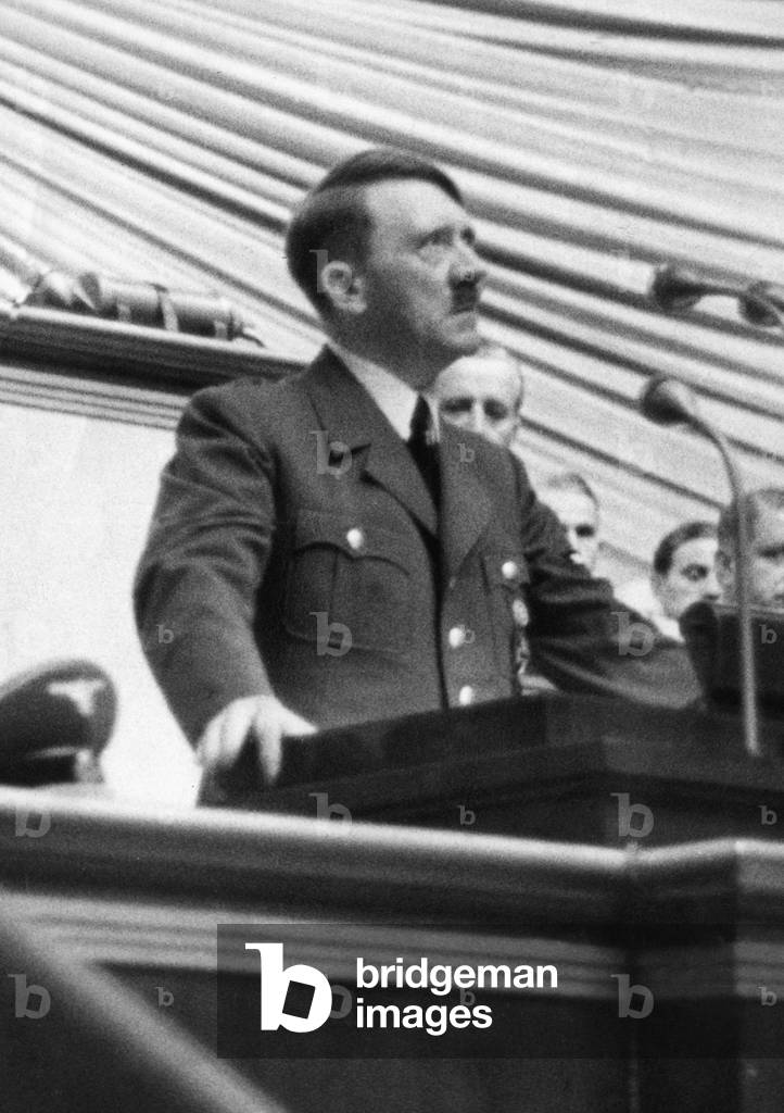 Image of Adolf Hitler giving a speech at the beginning of the