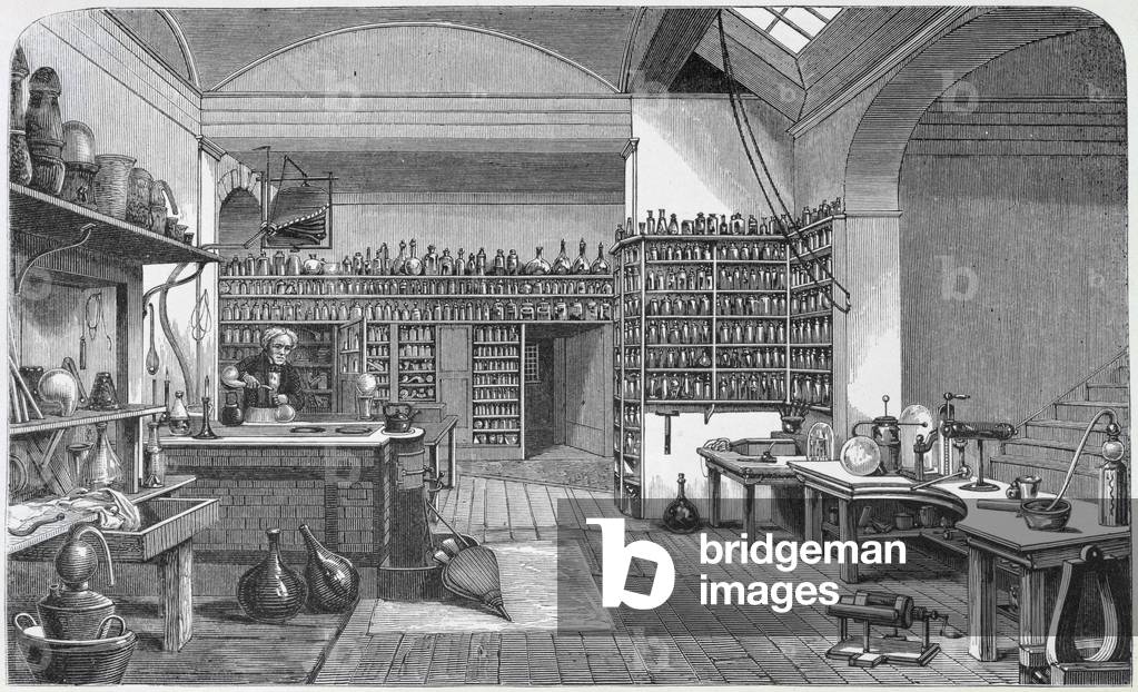 Image of Michael Faraday (1791-1867) in his basement laboratory, from ...