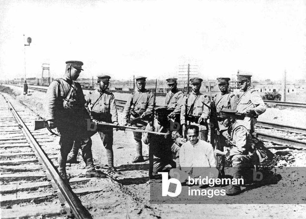 Image of Mukden, Manchuria: c. 1933. Japanese troops question a ...