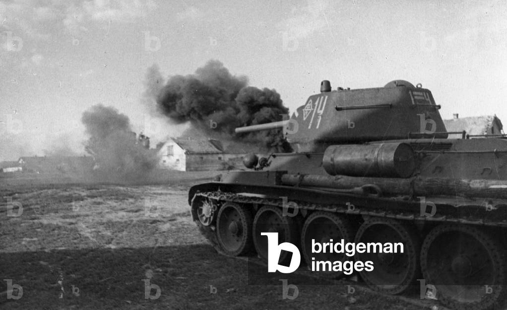 Image of World War 2. Soviet infantry advancing supported by T-34 tanks