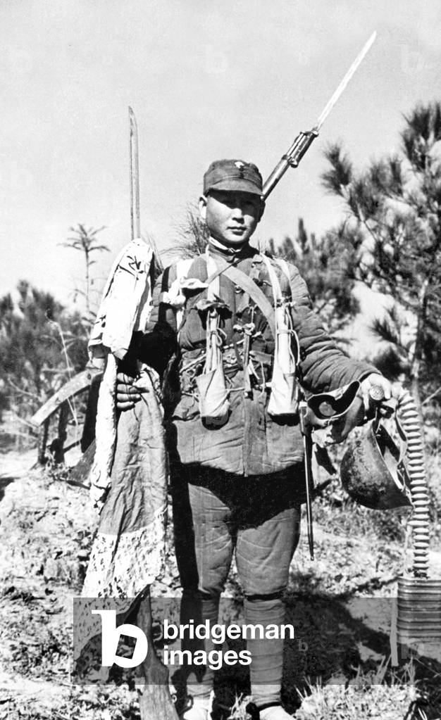 Image of Burma : A Chinese Soldier With Captured Japanese Equipment. 1942