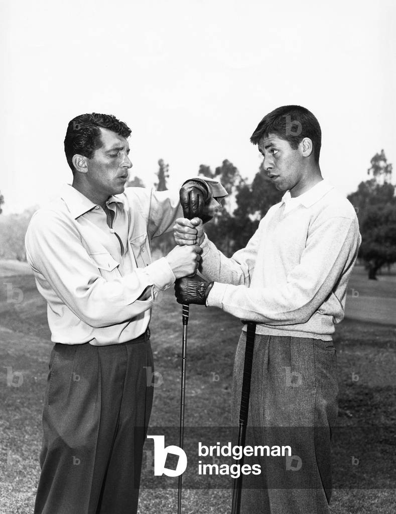 Image of Dean Martin and Jerry Lewis playing golf, California, c. 1953