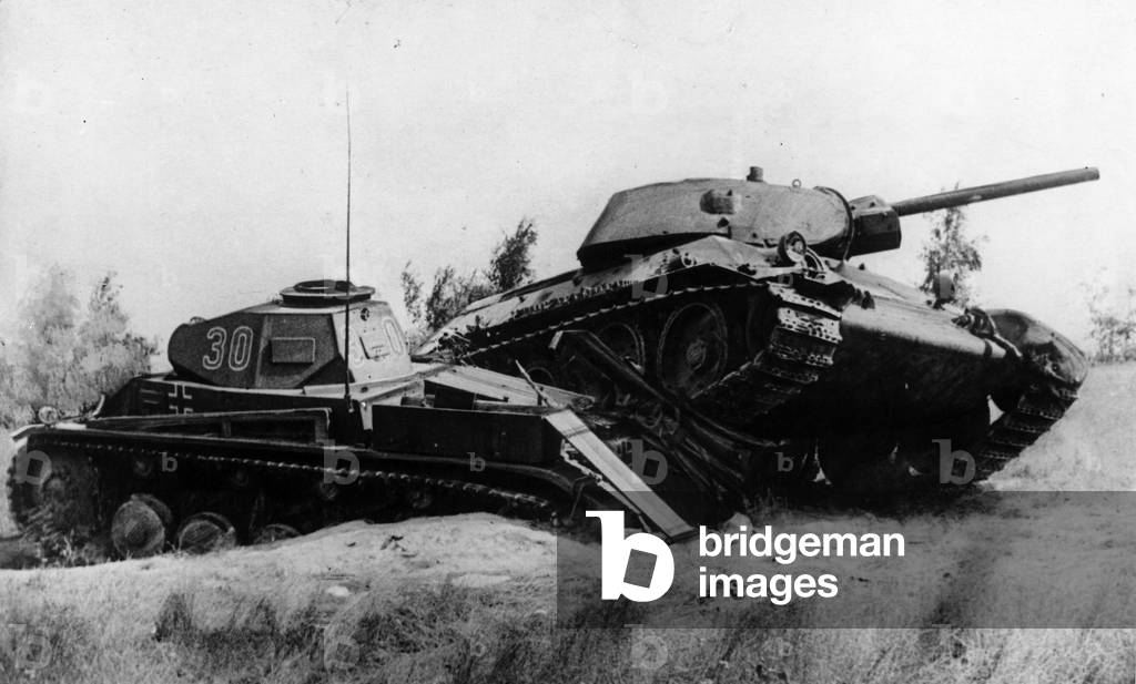 Image of World War 2. One of three enemy tanks (left) being