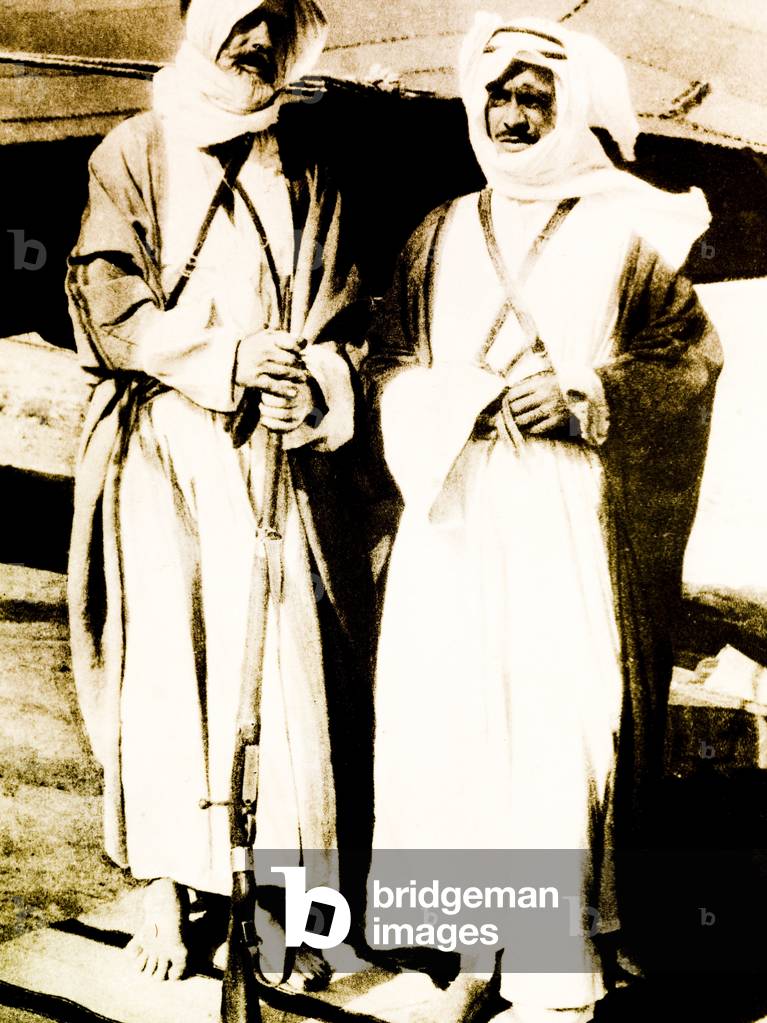Image of Two bedouin men on watch. Portrait of two bedouin men