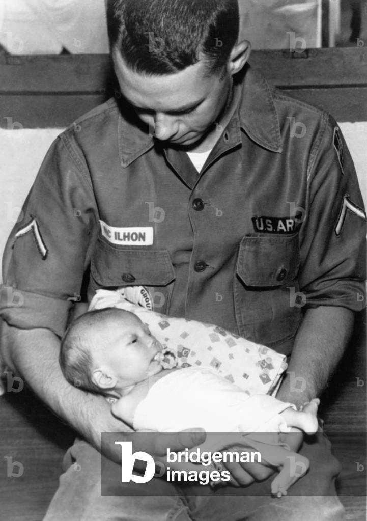 Image of Saigon, Vietnam: August 8, 1966 A private from the 120th Aviation