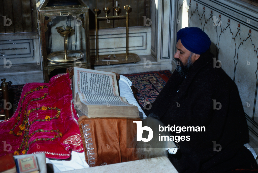 Image of Reading Sikh scripture Guru Granth Sahib in Golden Temple ...