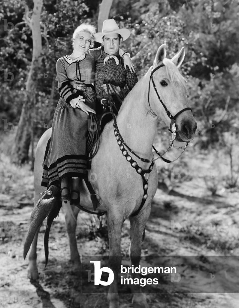Image of FIGHTING THRU, from left: Jeanette Loff, Ken Maynard, 1930