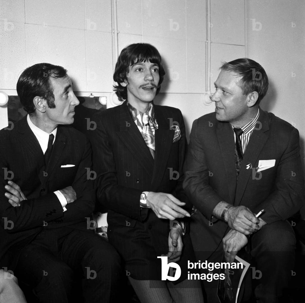 Image of Antoine and Oleg Popov congratulating Charles Aznavour, 1967 ...