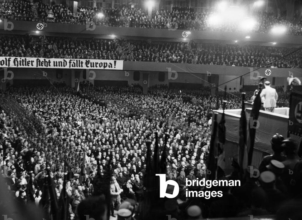 Image of A banner saying "Europe stands and falls with Adolf Hitler"