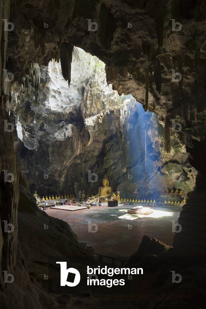 Image of Buddha statues inside the underground cave temple, Khao Luang ...