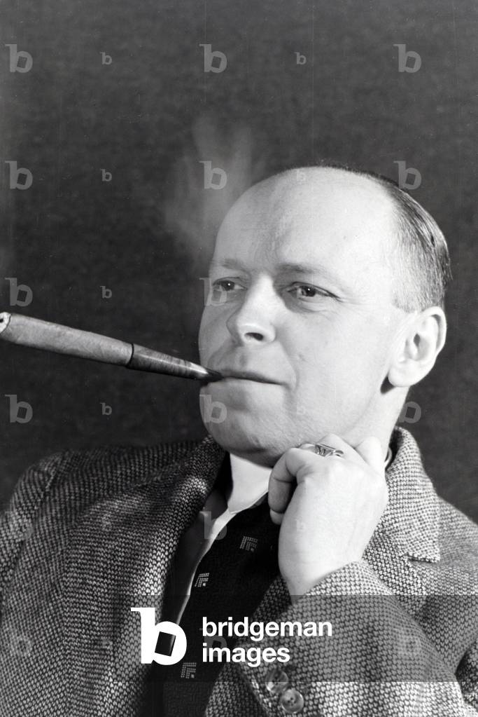 Image of A man smoking a cigar for an advertising campaign, Germany