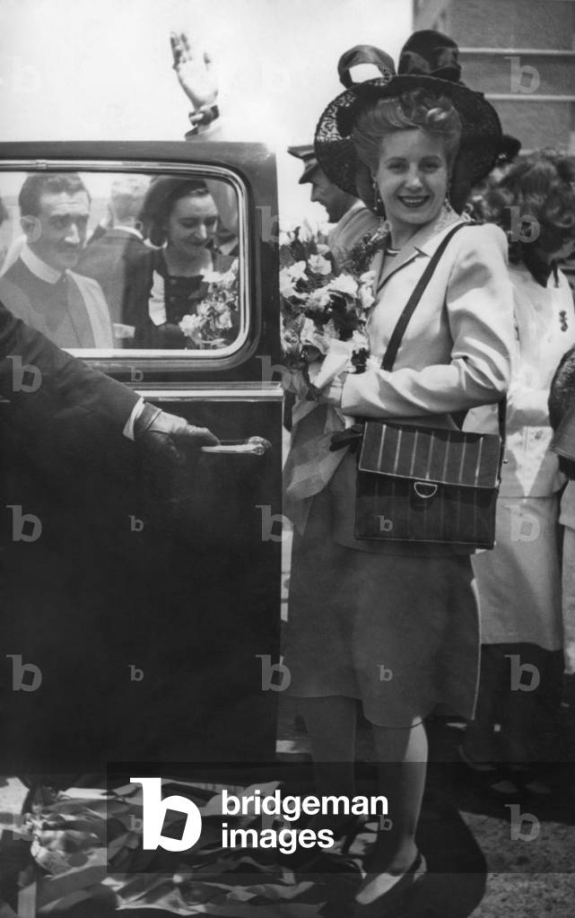 Image of Evita Peron, wife of the Argentinian President Juan Peron greeted