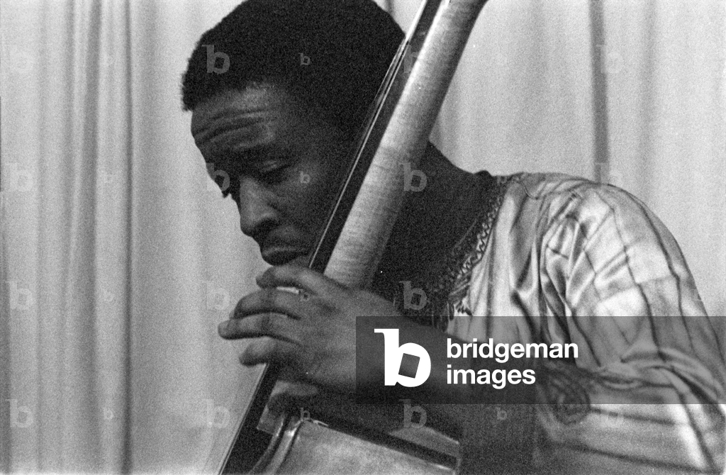 Image of Black and white photo of an unidentified double bass player