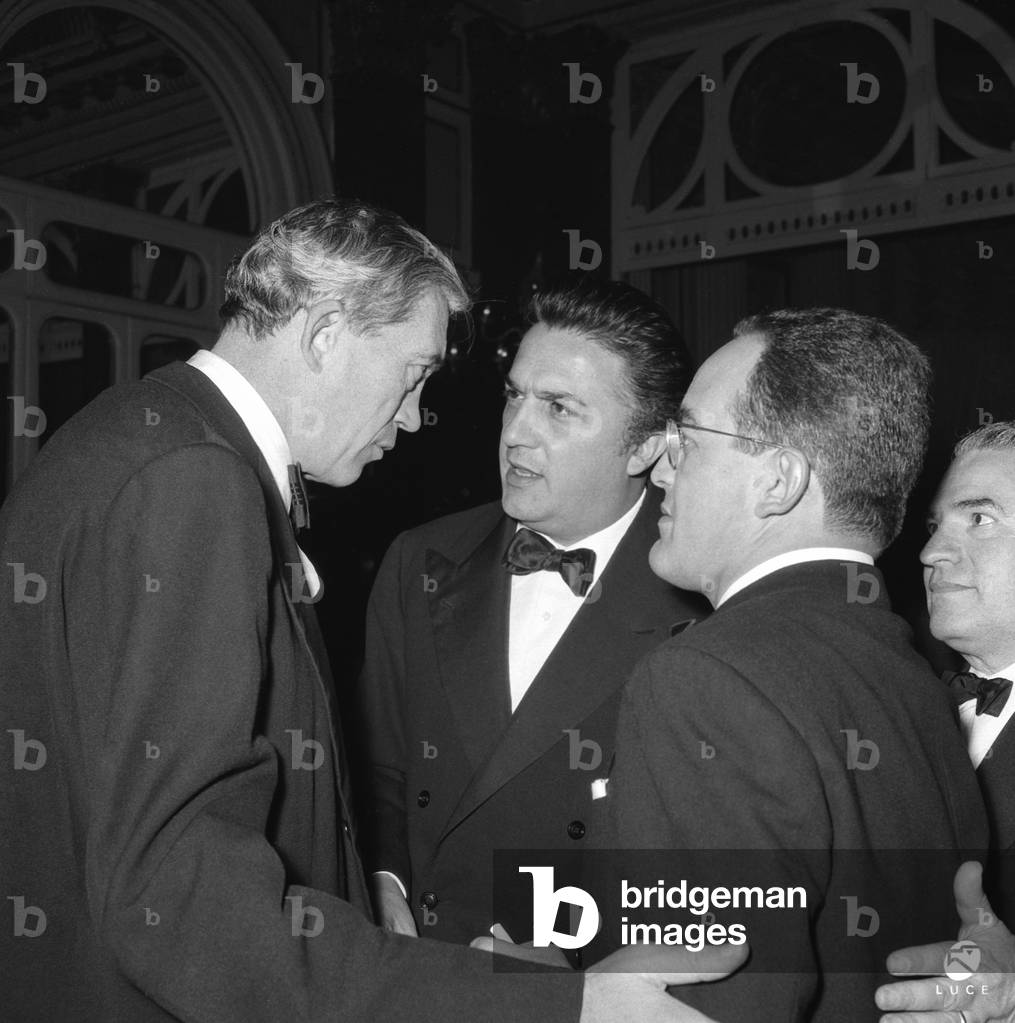 Image Of John Huston Federico Fellini And Dino De Laurentiis Converse On