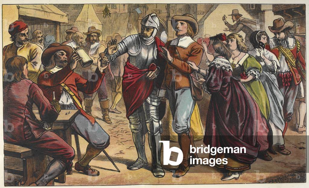 Image of Two pilgrims walking trough a town.