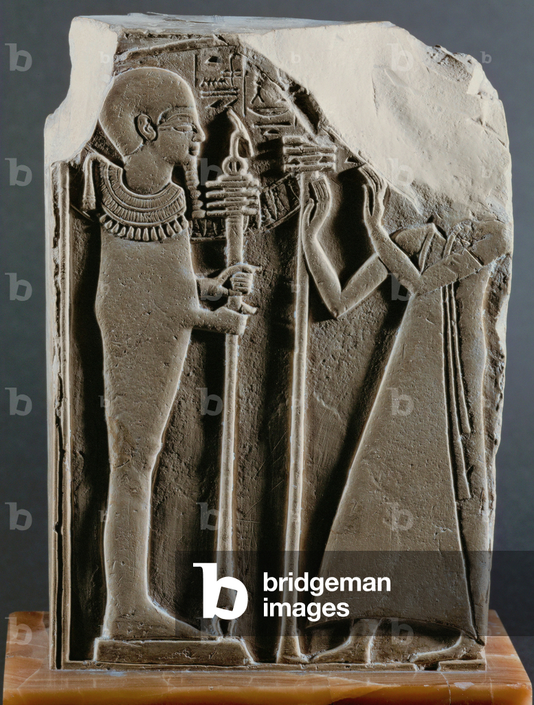 Image of God Ptah, patron deity of craftsmen, with worshipper