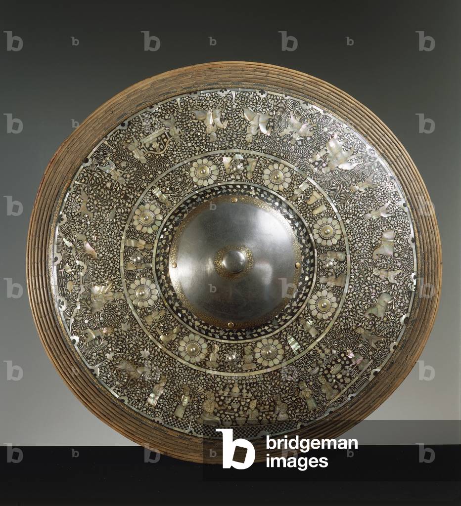 Image of Round shield made of gold damascened steel, Indian cane, silk,