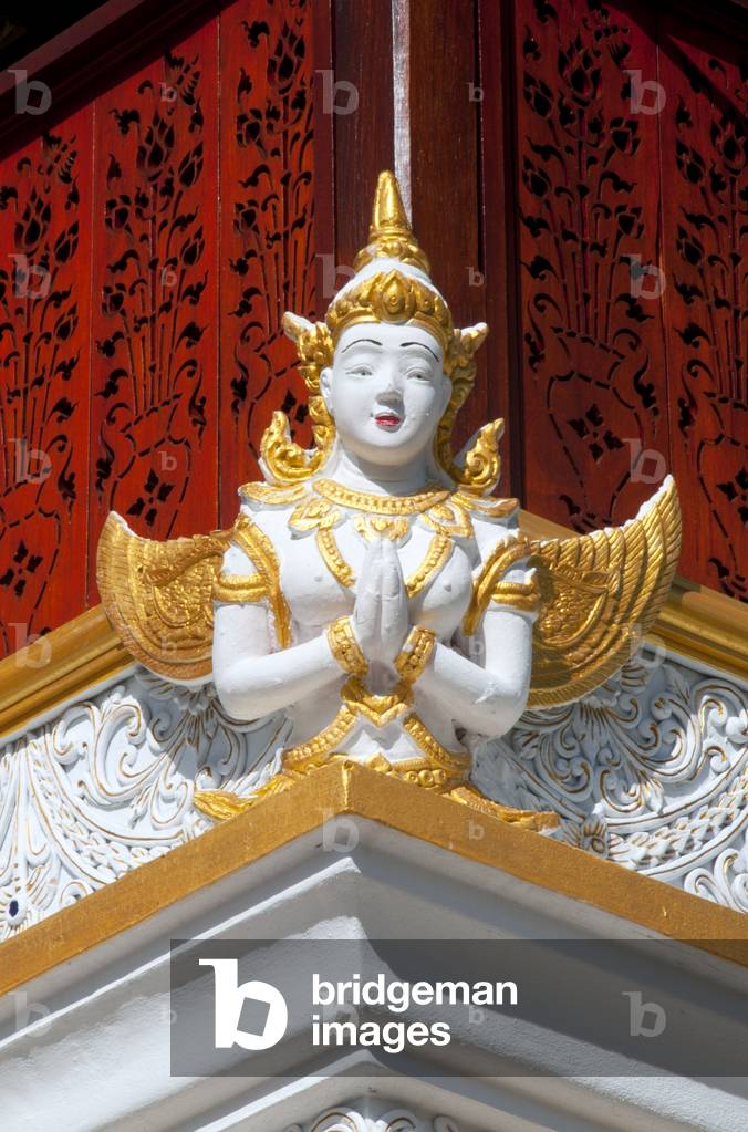 Image of Thailand: Sculpture of a thewada (angel) on the Ho Trai