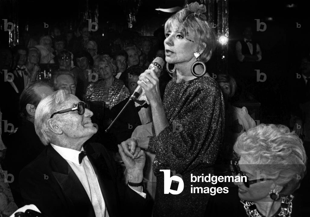 Image of French Singer Annie Cordy Singing For Lyric Writer Andre Hornez'S