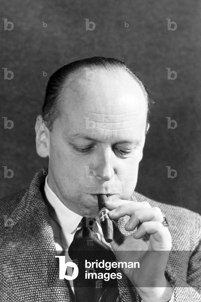 Image of A man smoking a cigar for an advertising campaign, Germany