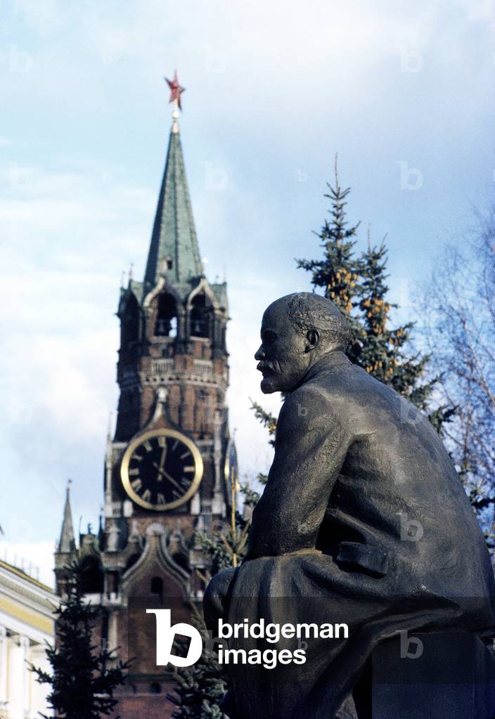 Image of Statue of Lenin and the Spasskaya Tower behind, Moscow, Russia