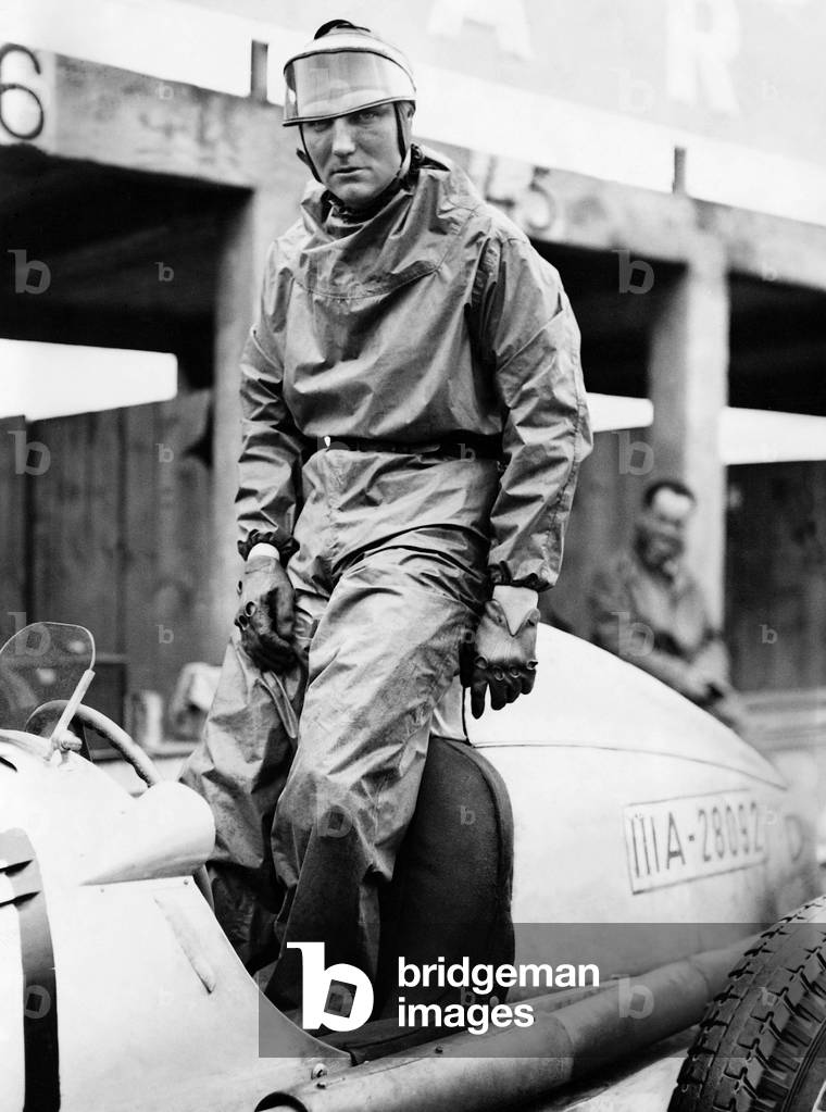 Image of Manfred von Brauchitsch with his Mercedes, 1935 (b/w photo)