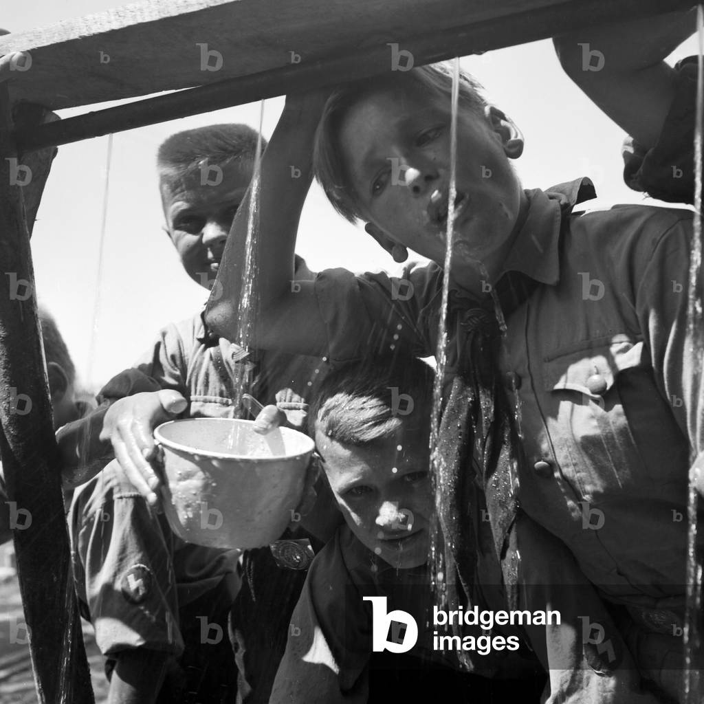 Image of Hitler youths drinking from a well at Spitz, Lower Austria,