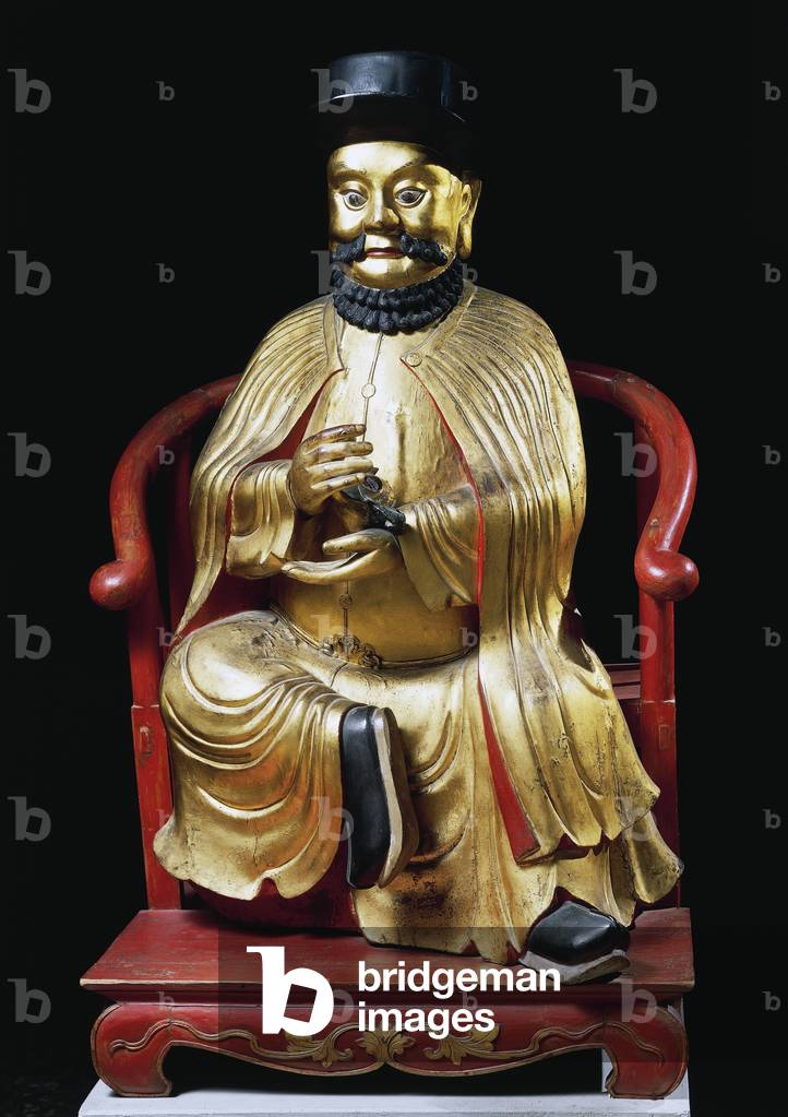 Image of Gilded and painted wooden idol worshiped in Temple of 500 by ...