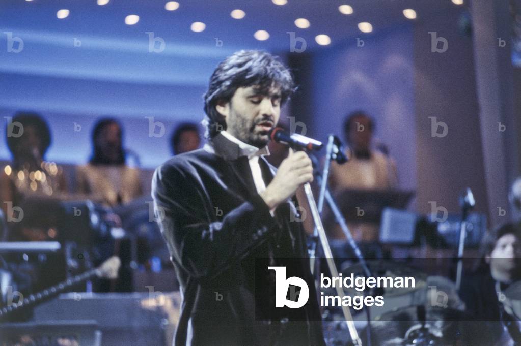 Image of Andrea Bocelli singing at the 45th Sanremo Music Festival