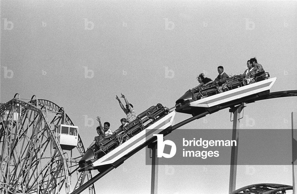 Image of Thrill seekers on amusement park ride Rocket Rail roller ...