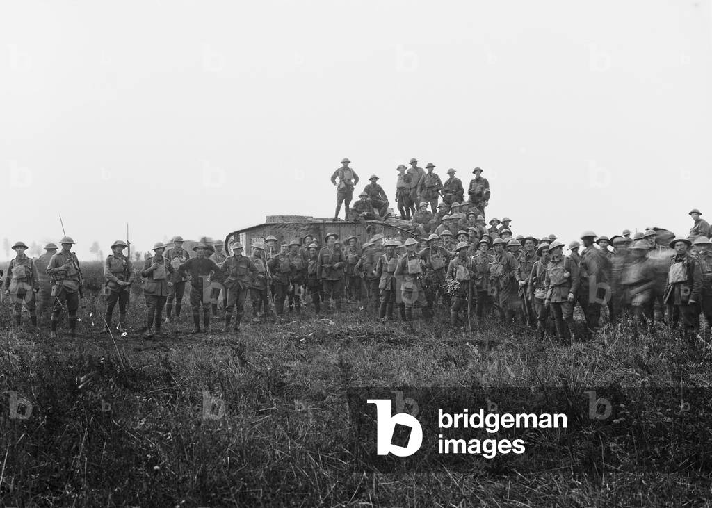 Image of Outdoor group portrait of a tank crew and some members by ...