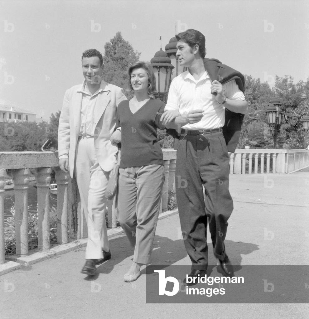 Image of Jean Claude Pascal and Anouk Aimée walking together, Italy, 1955