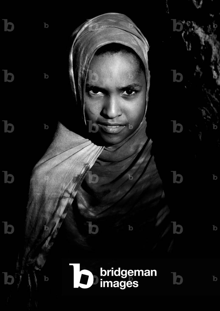 Image of A young girl's portrait, In the half light of dusk,