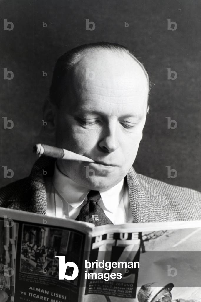 Image of A man smoking a cigar for an advertising campaign, Germany