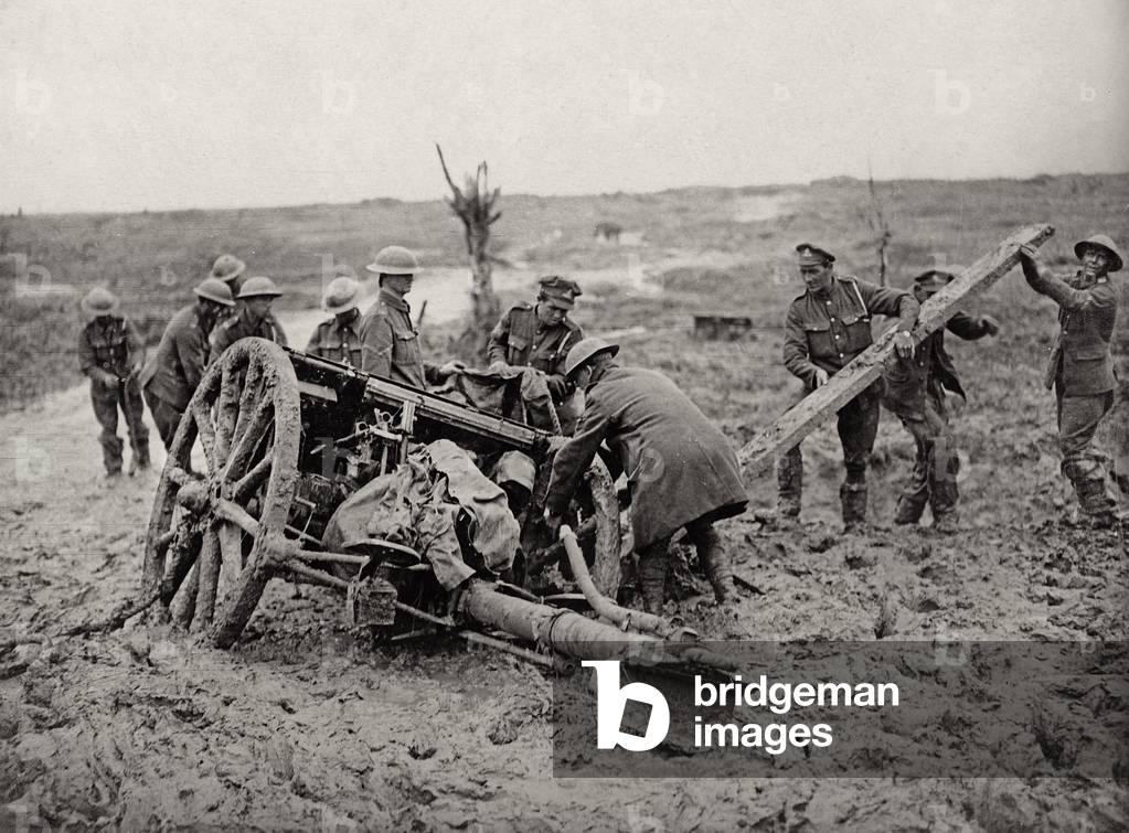 Image of Jacking a field gun out of the mud to get