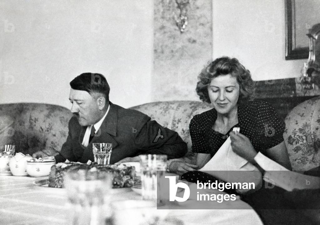 Image of Hitler and Ava Braun at dining table at Berchtesgaden, c.