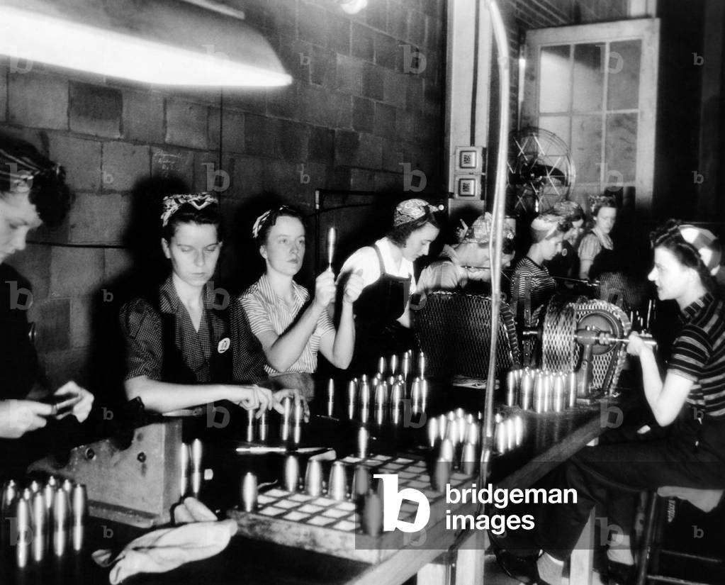 Image of American women manufacturing high explosive shells. At the ...