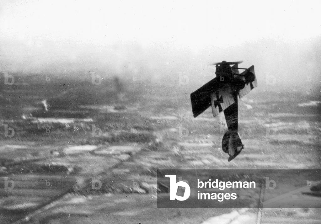 Image of German fighter plane doing a loop, 1918 (b/w photo)