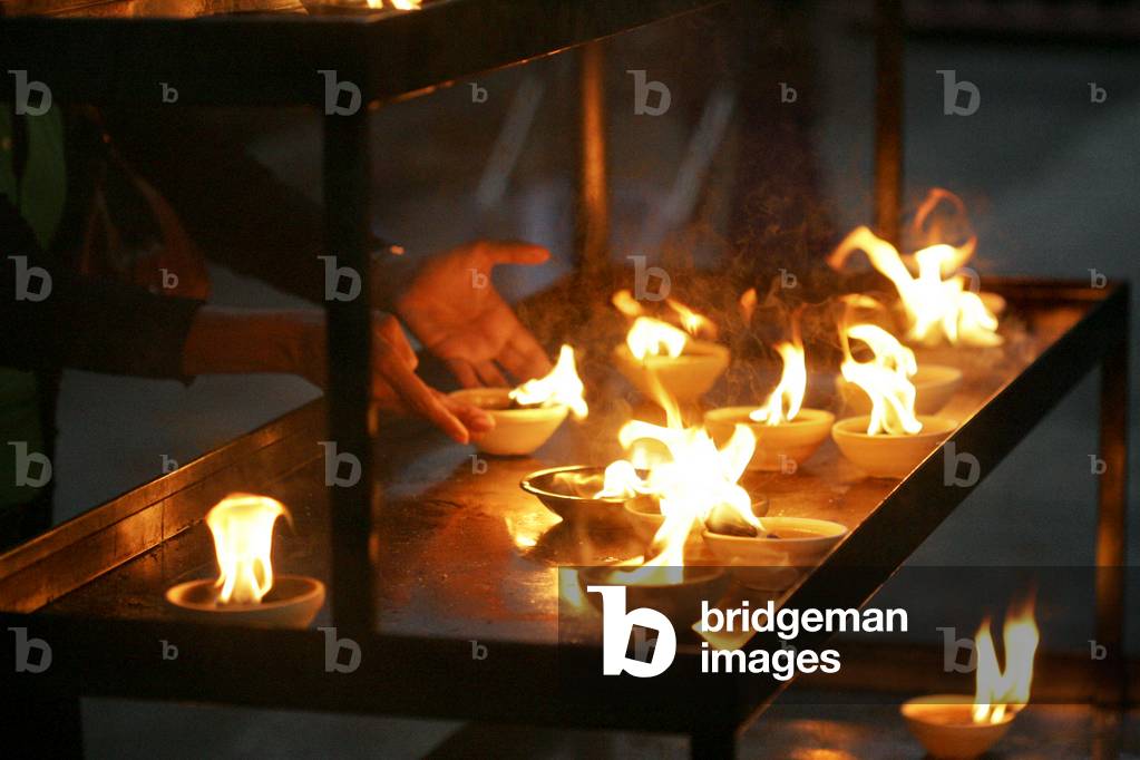 Image of Candle Lighting, Chinese New Year festivities, Singapore (photo)