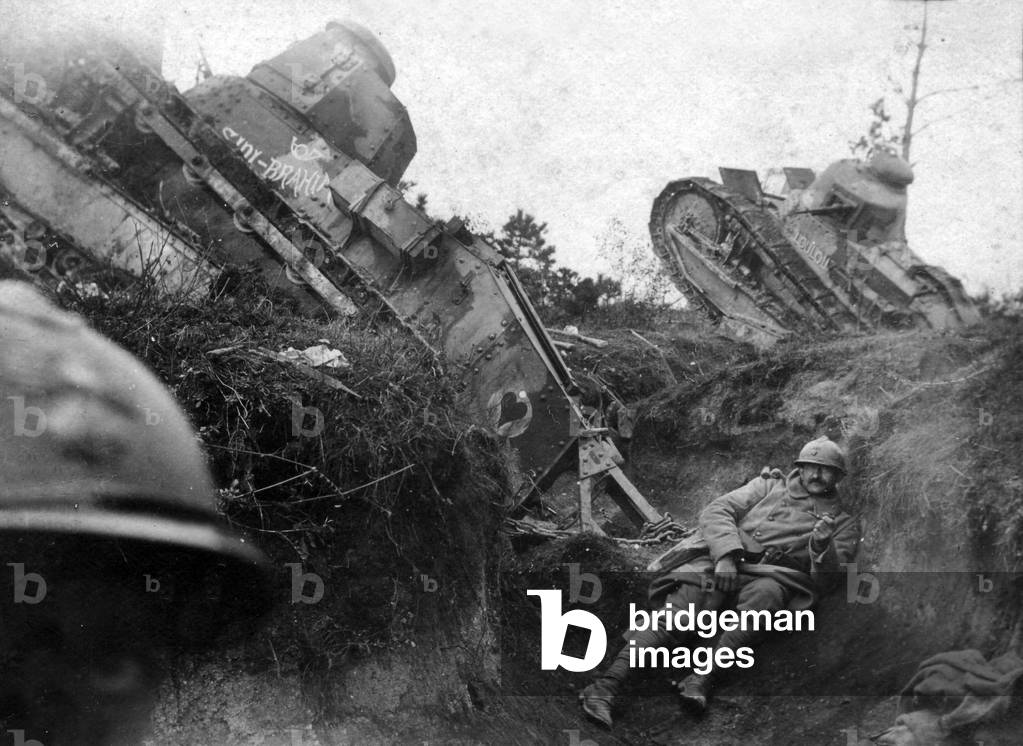 Image of French soldiers in a trench with a Renault FT17 tank,