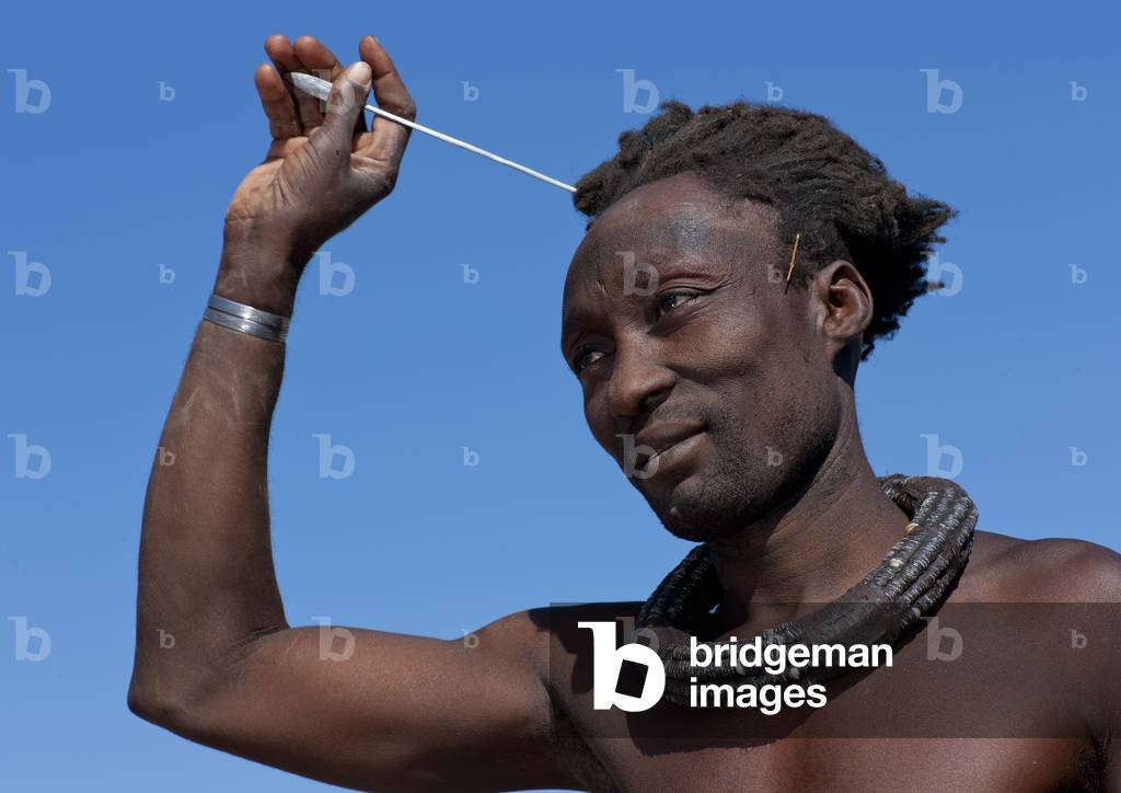 Image of Himba Man with Traditional Hairstyle, Angola, Africa (photo)