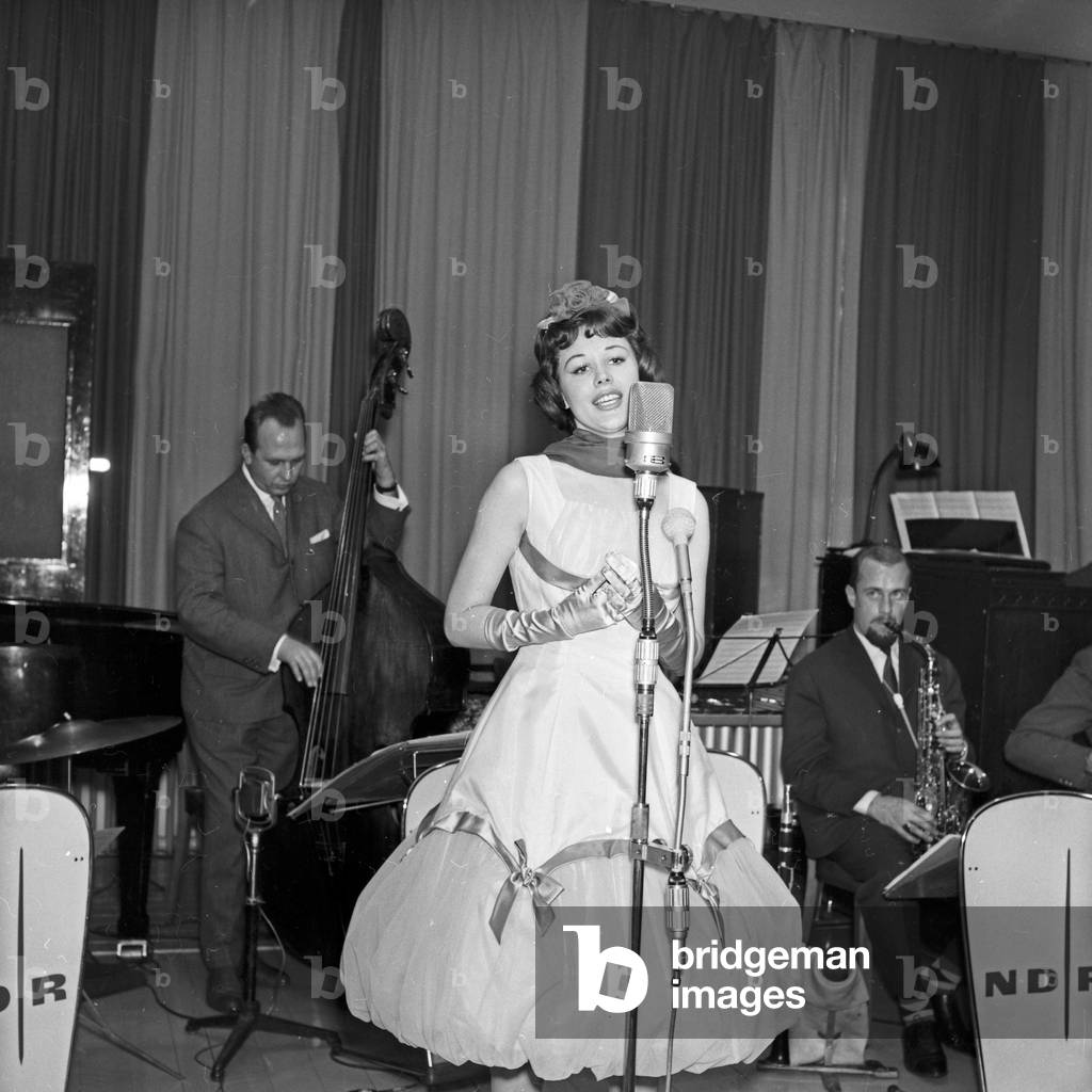Image of German actress and Schlager singer Rica Deus performing ...