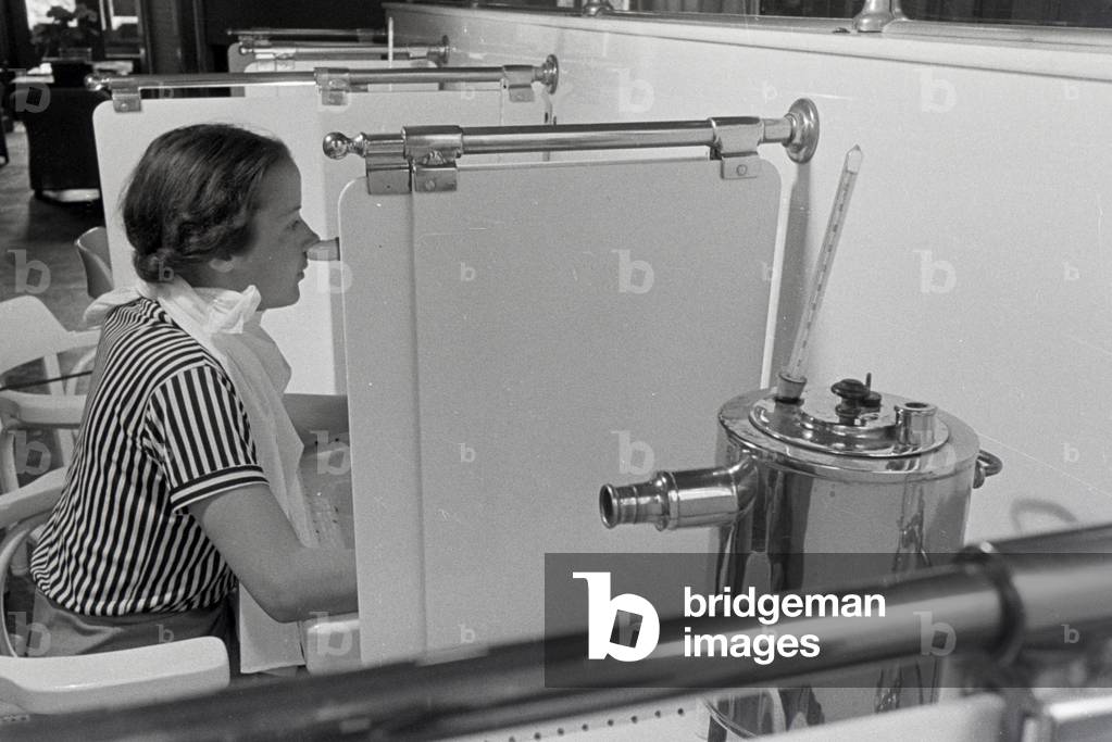 Image of A young woman in the brine inhalation room during her