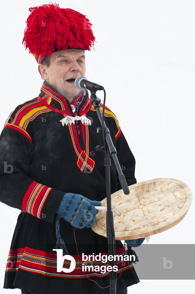 Image of Sami man in traditional costume singing in Jokkmokk, Lapland ...