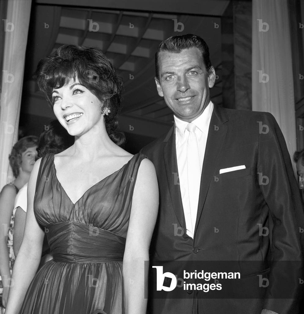 Image of Joan Collins and Richard Egan, Italy, 1960 (b/w photo)