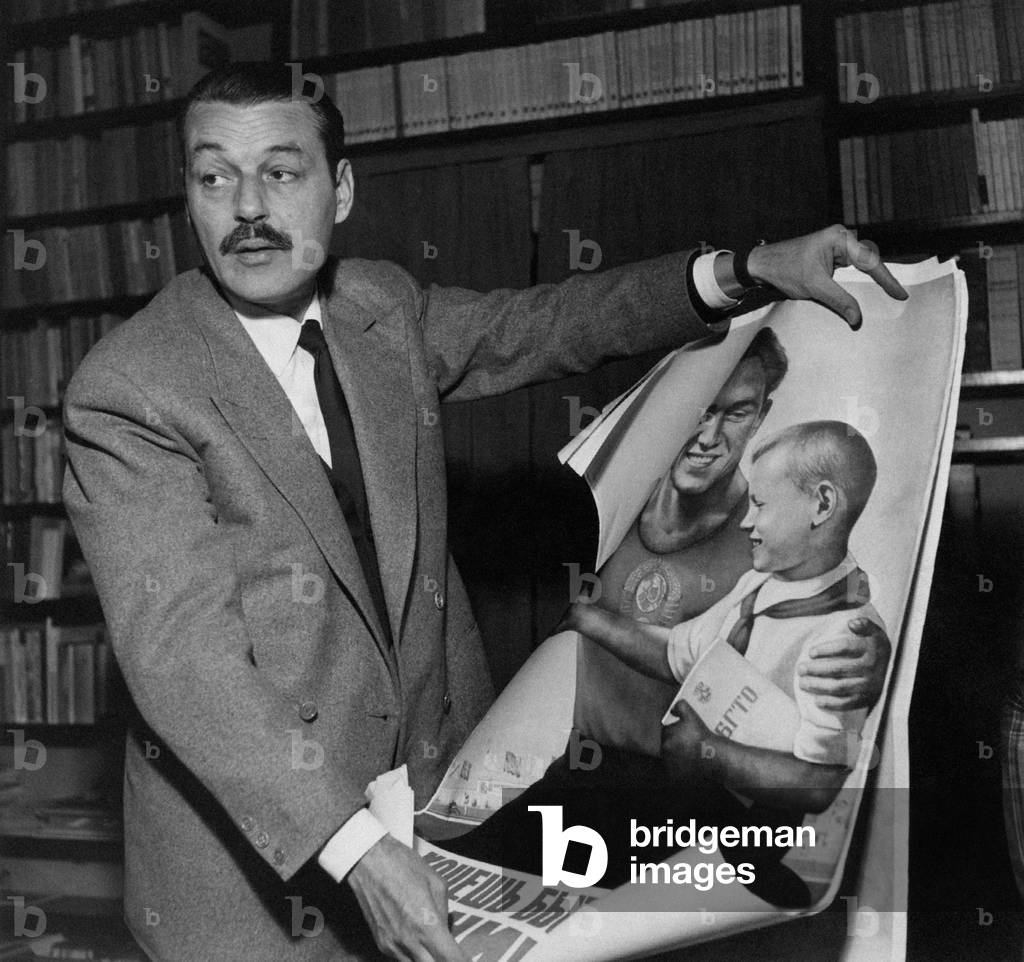 Image of Enrico Emanuelli showing a poster