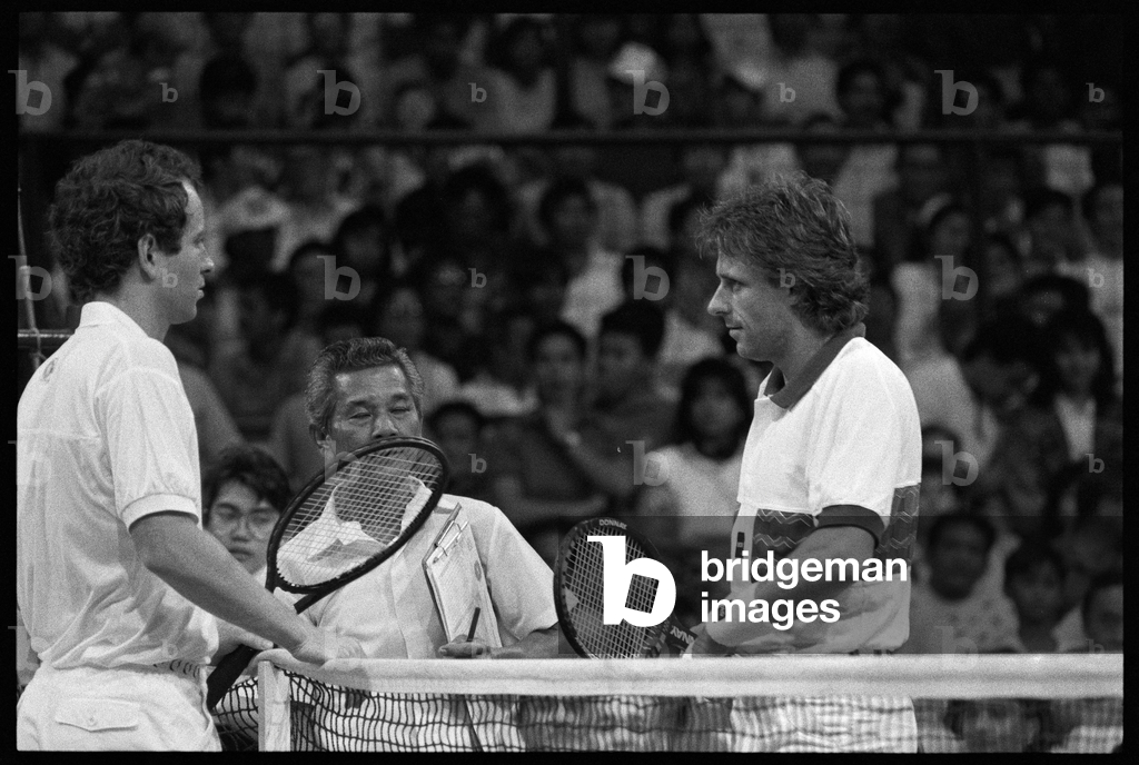 Image of A Filipino referee is set to toss a coin in by Ranoco, Romeo