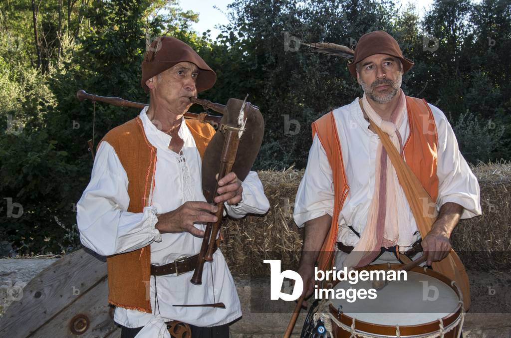 Image of Medieval piper and drummer